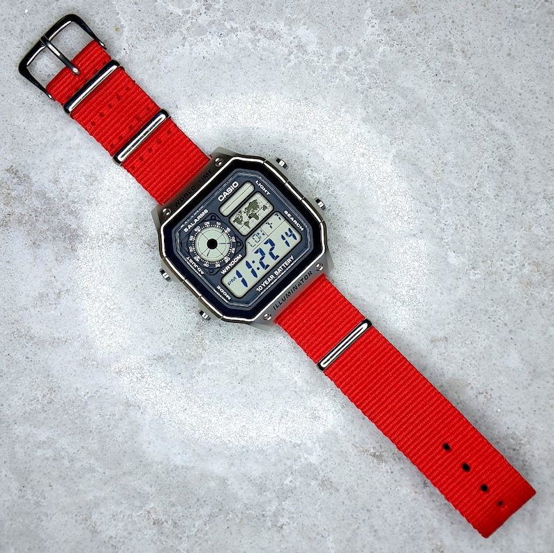 Casio World Time Illuminator Silver Watch With Red Nylon Band, AE ...