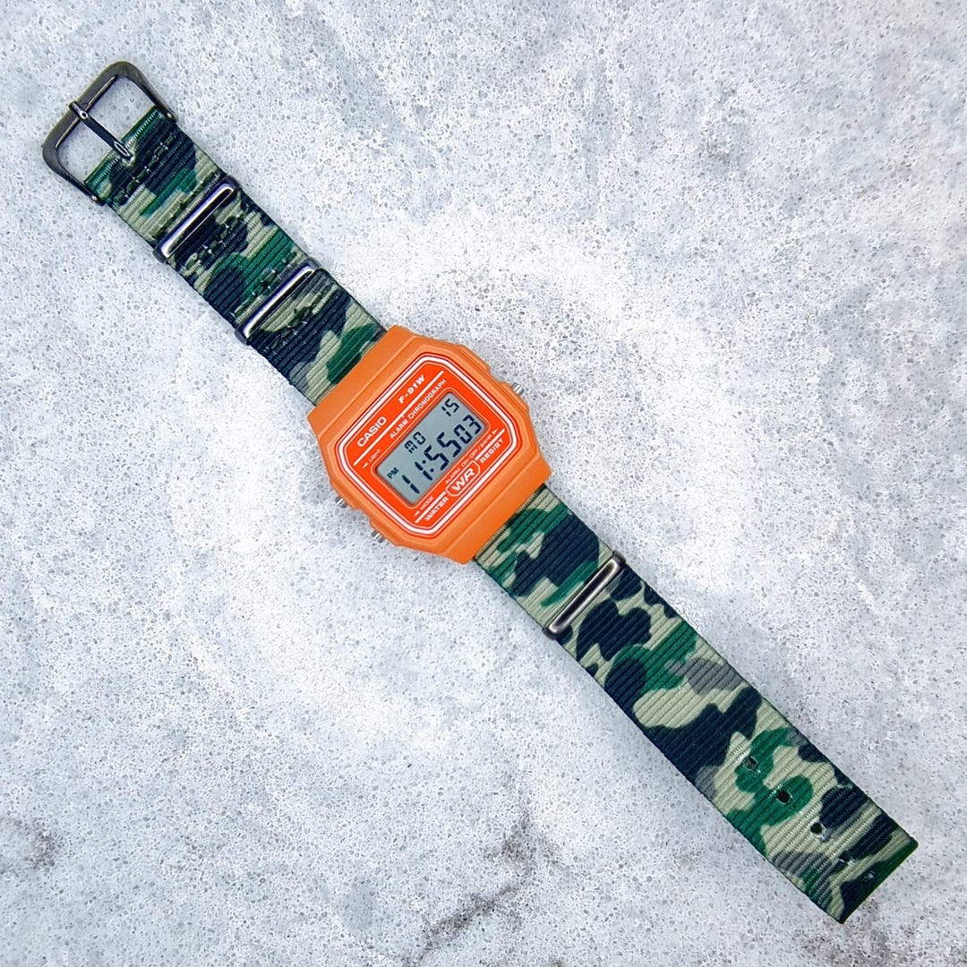 Casio Digital Watch Orange Edition on Jungle Camo Nylon Strap, F91WC ...
