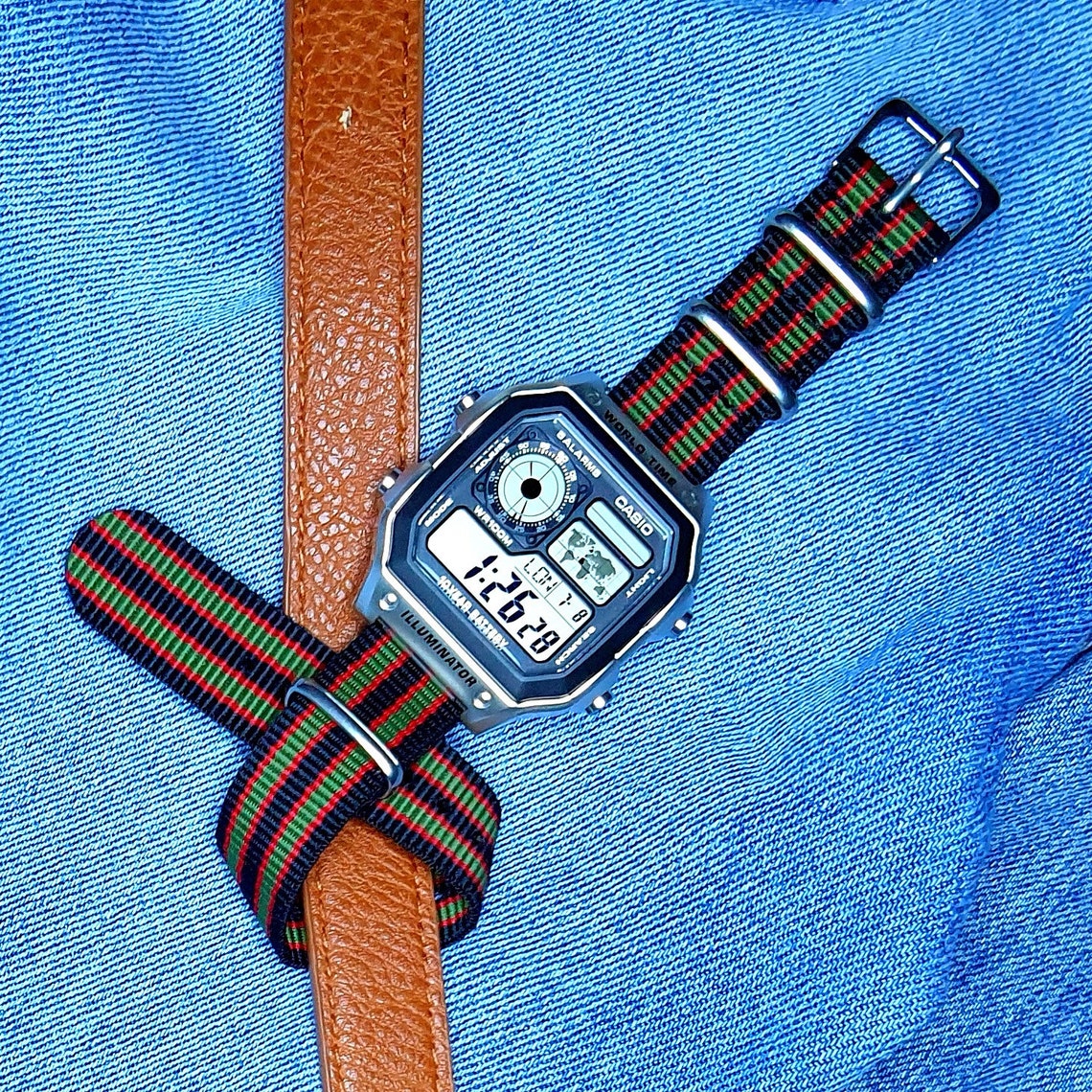 Casio World Time Silver Illuminator Watch With James Bond Ballistic ...