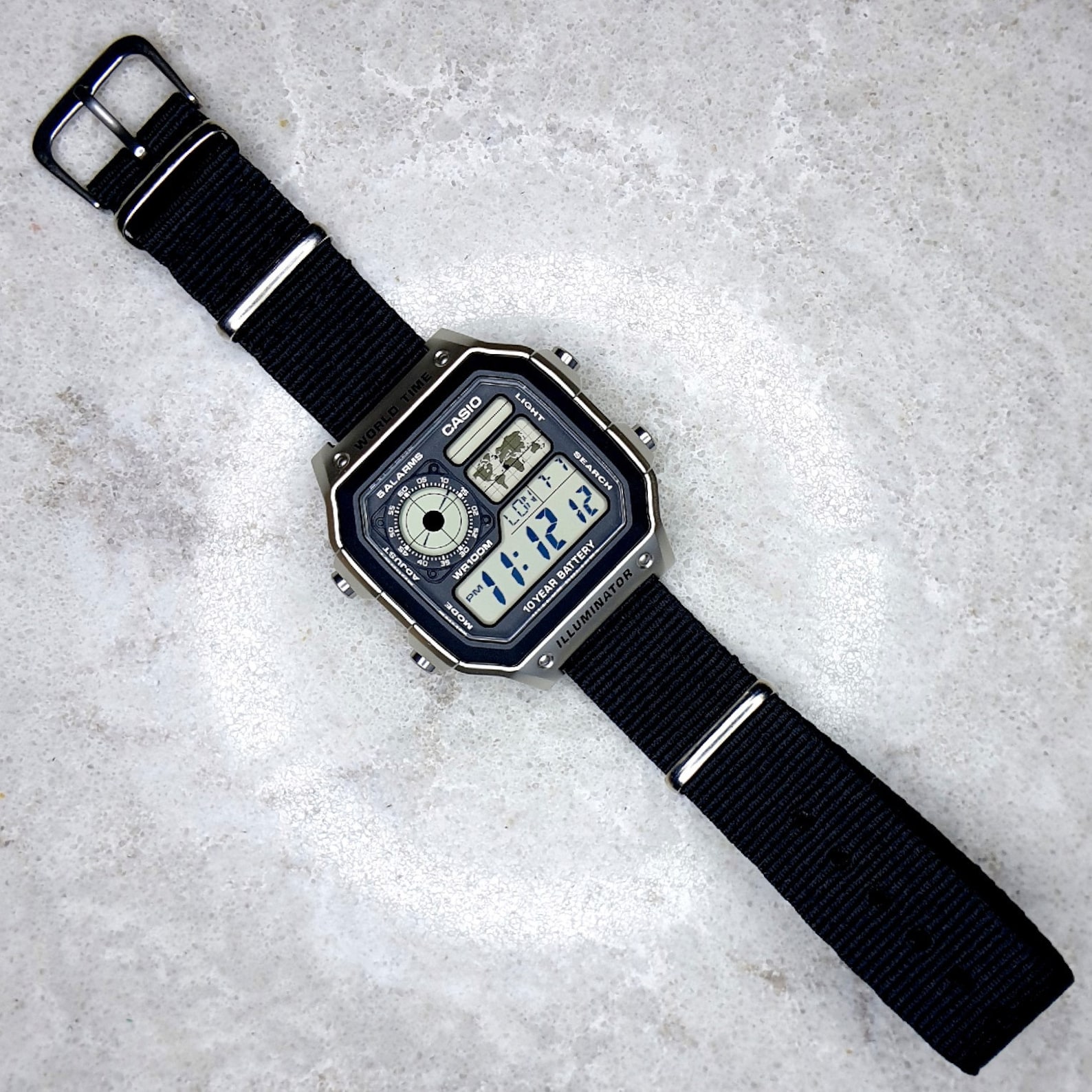 Casio World Time Illuminator Silver Watch With Black Nylon Band, AE ...