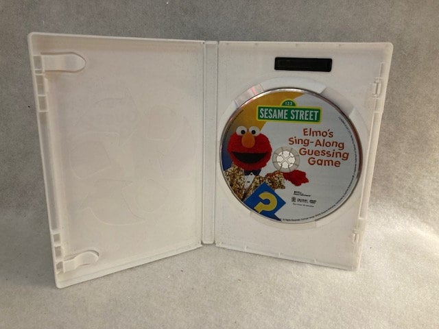 Sesame Street Dvd's "imagine That" & Elmo's Sing-along Guessing Game ...