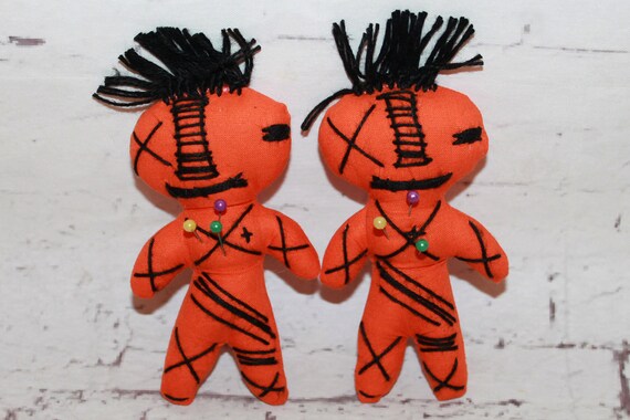 Voodoo Dolls With Pins