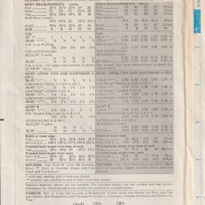 Misses 3 Tiered Skirt & Fitted Vest Style Top With Shaped Hemline ...