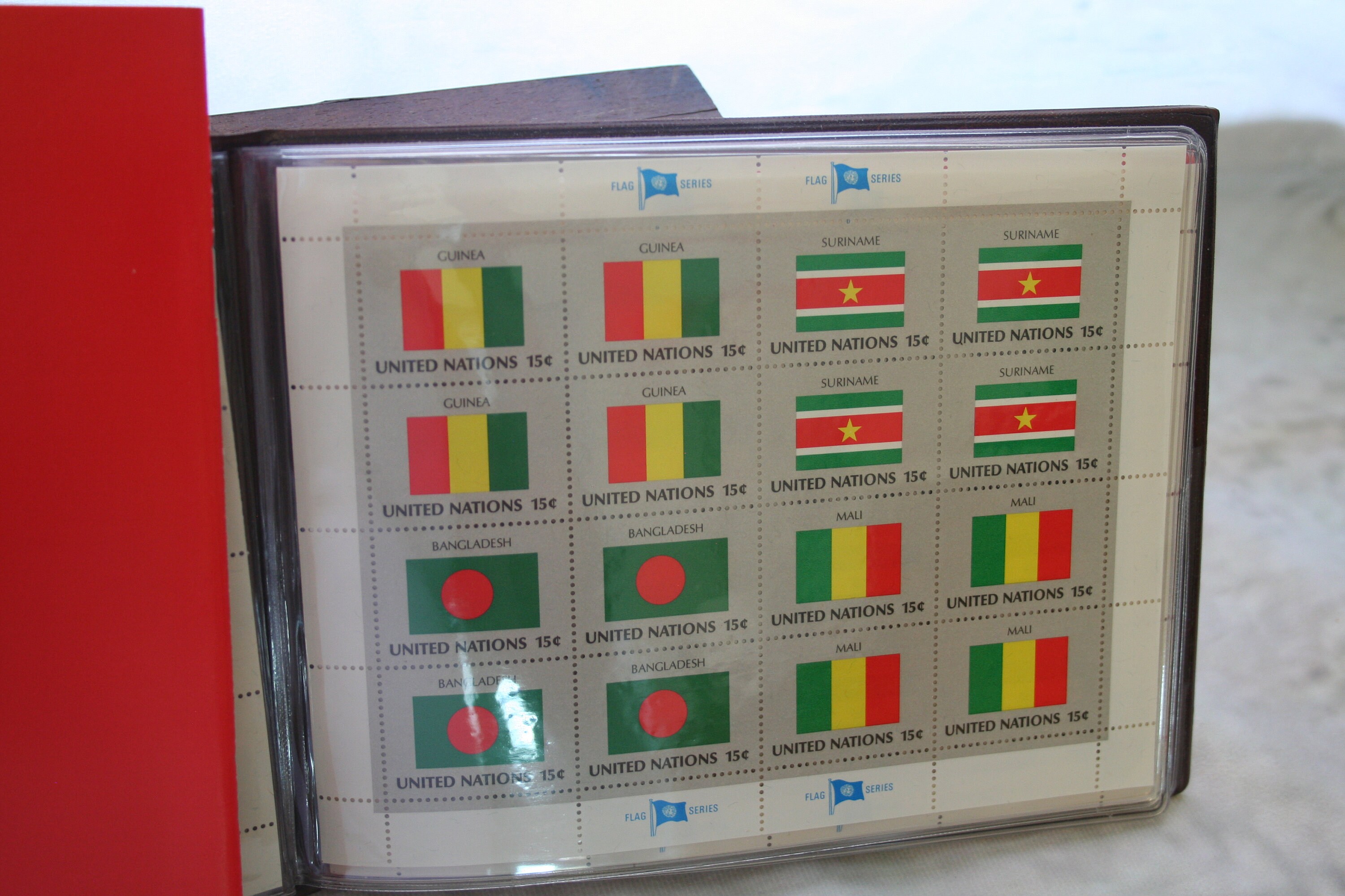 STAMP COLLECTION Flags of the United Nation 1980 Collection Featuring ...
