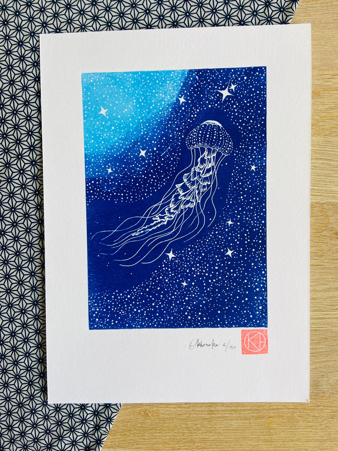 Blue artisanal linocut - Jellyfish dancing with stars on pure white ...