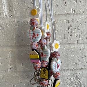 Teacher A+ Smiley Daisy Pencil Stretchy Silicone Beaded Lanyard for ...