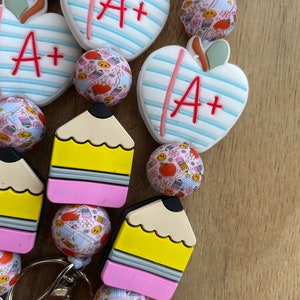 Teacher A+ Smiley Daisy Pencil Stretchy Silicone Beaded Lanyard for ...