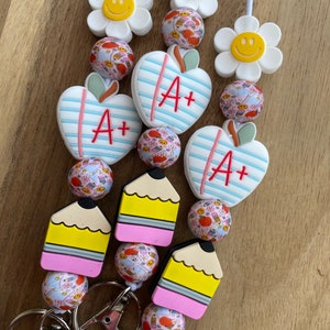 Teacher A+ Smiley Daisy Pencil Stretchy Silicone Beaded Lanyard for ...