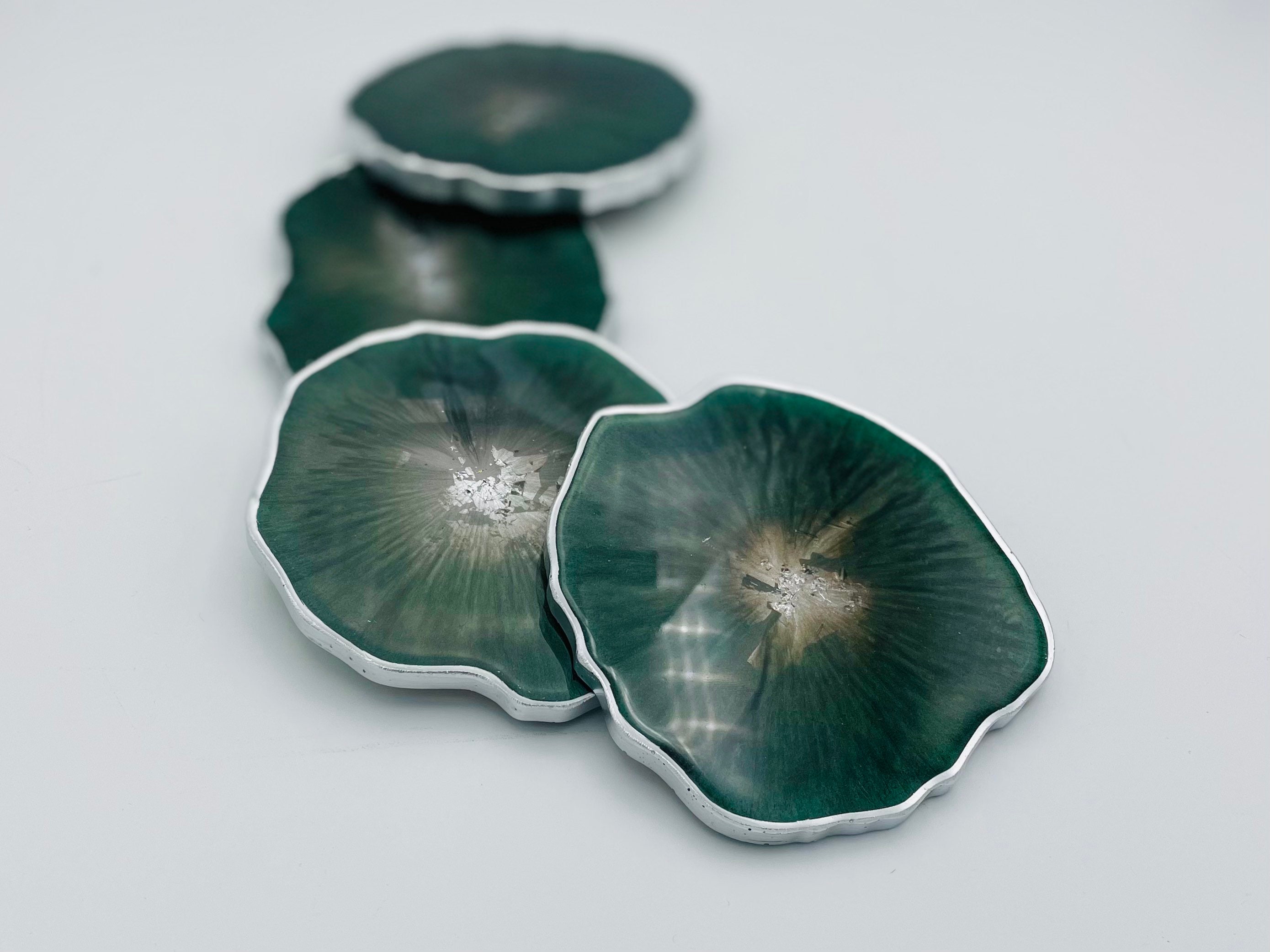 Deep emerald green resin coasters with gold or silver accents | Etsy