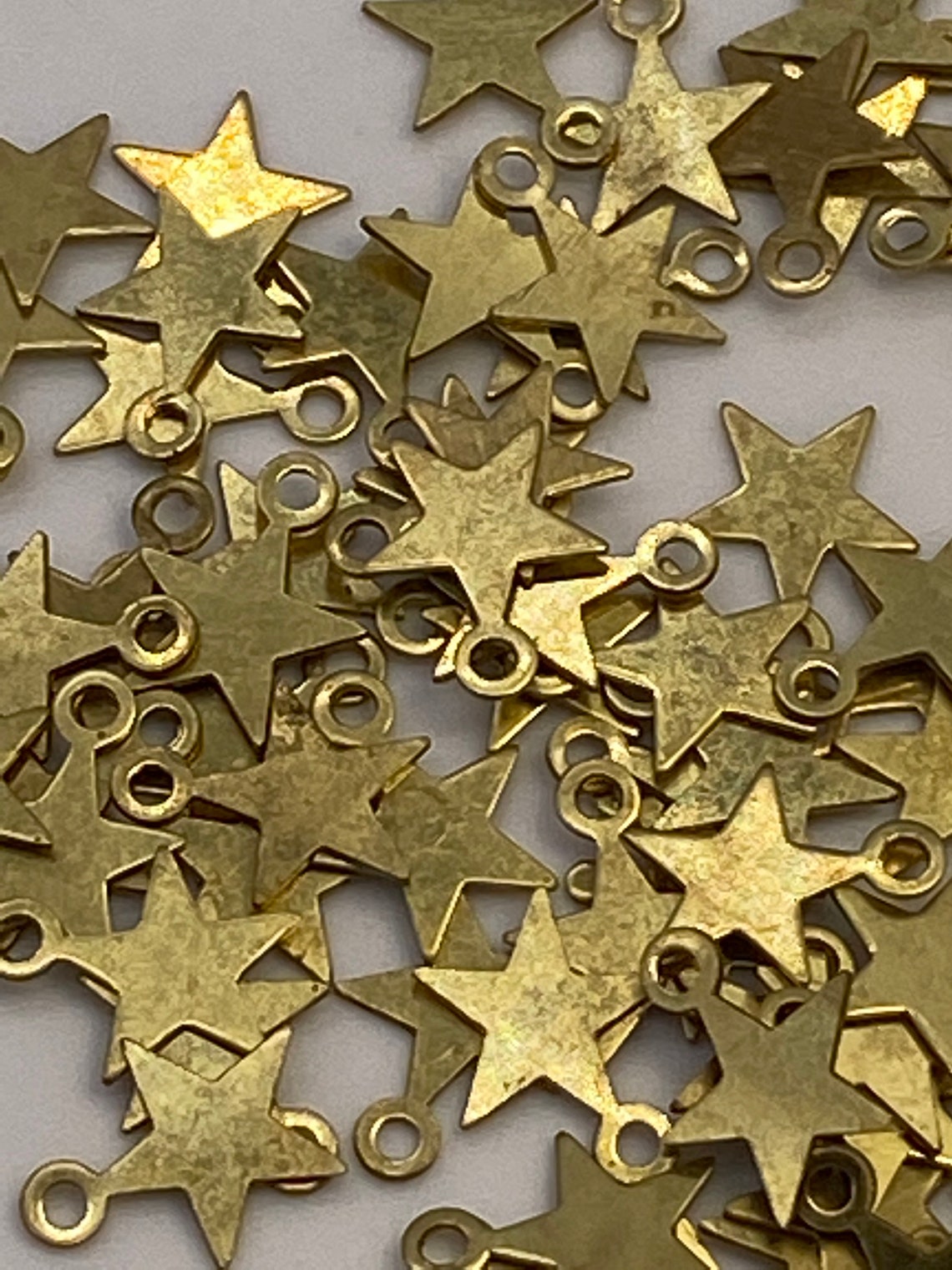 Small delicate brass stars. 60 peices per price | Etsy