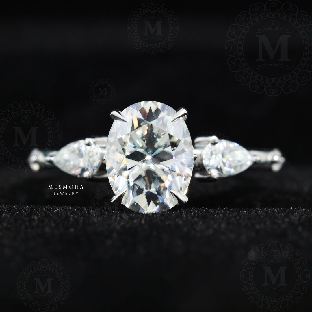 Three Stone Oval Engagement Ring Oval Engagement Ring With Pear Side ...