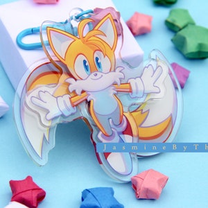 Spinning Tails Charm - Etsy UK