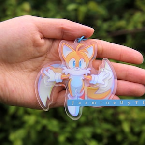 Spinning Tails Charm - Etsy UK