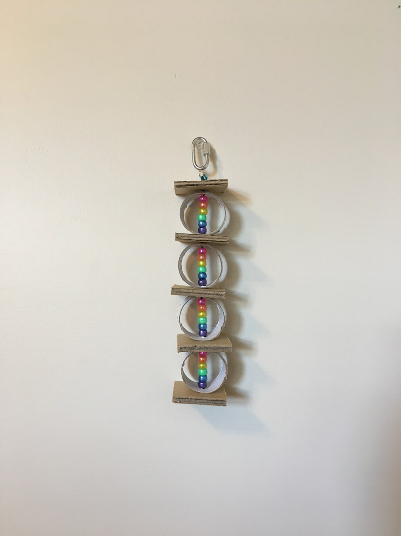 Rainbow beaded Cardboard shredding bird toy | Etsy