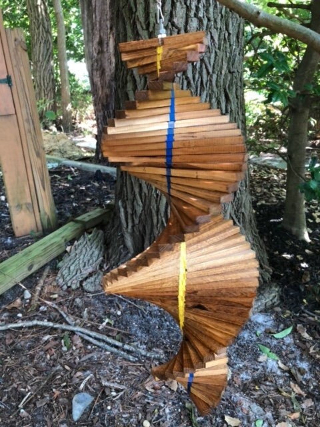 2' Golden Brown Cedar Wood Wind Spinner With the Blue and Yellow Colors ...