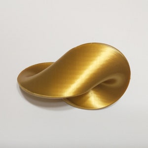 3D Printed Toy anti Oloid With Uniform Thickness Wobbling Motion Home ...