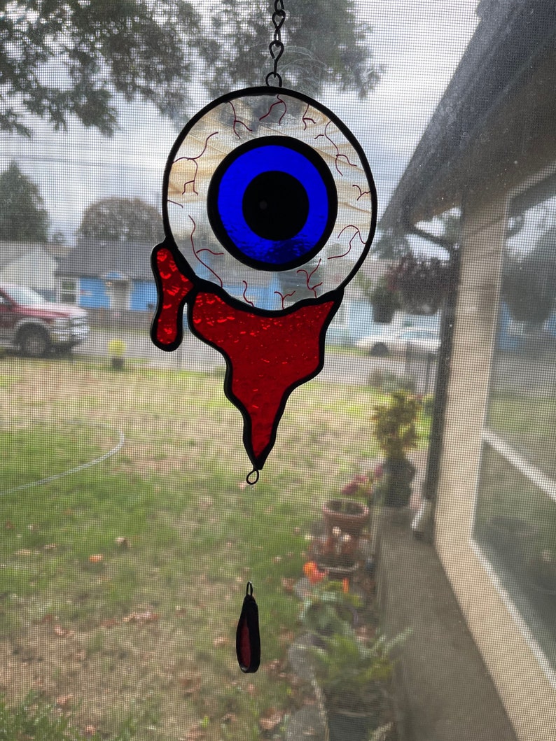 gore Bloody iridescent sun catcher blue home decor eyeball drip stained ...