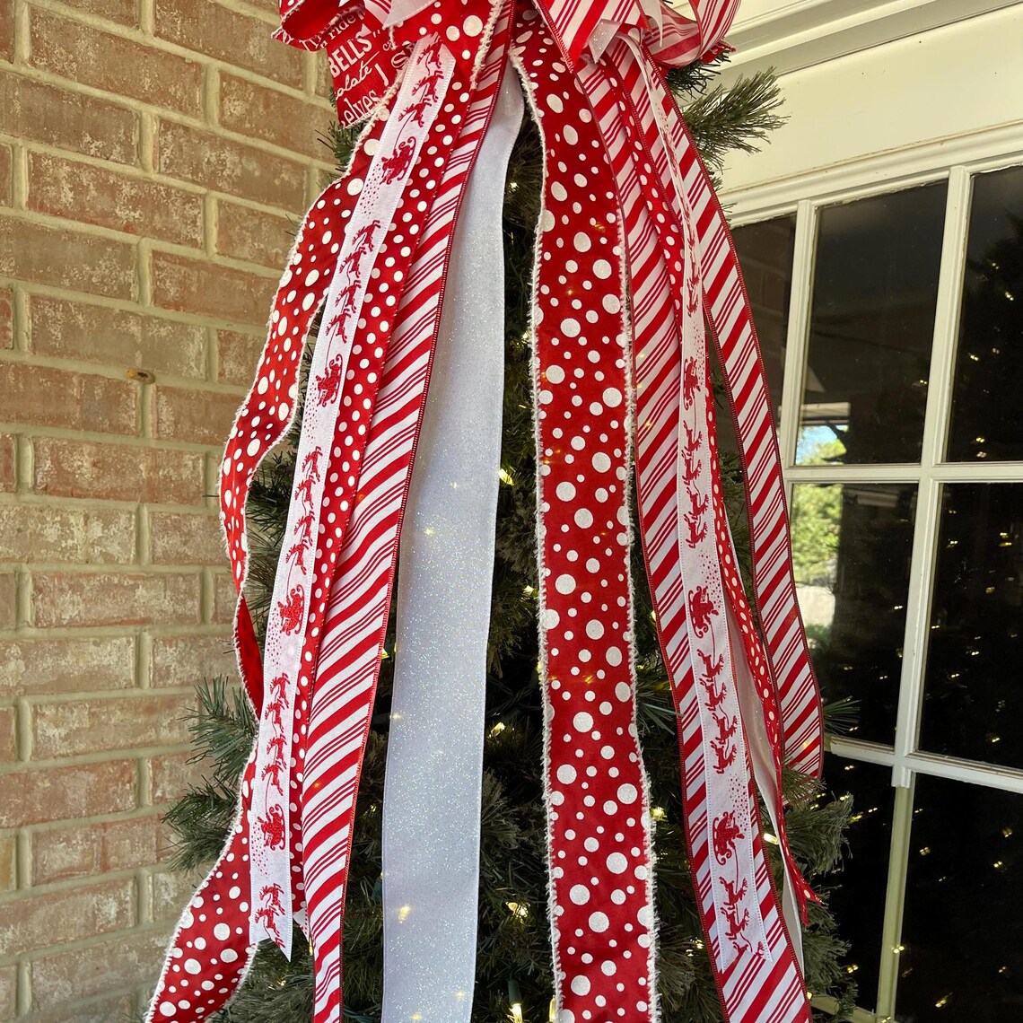 Large Christmas Peppermint Tree Topper Designed With Red White Ribbons ...