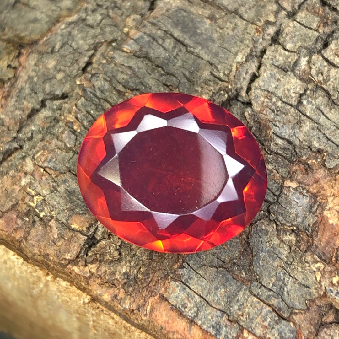 Red Color Natural Faceted Ethiopian Opal Oval With Orange Fire Gemstone ...