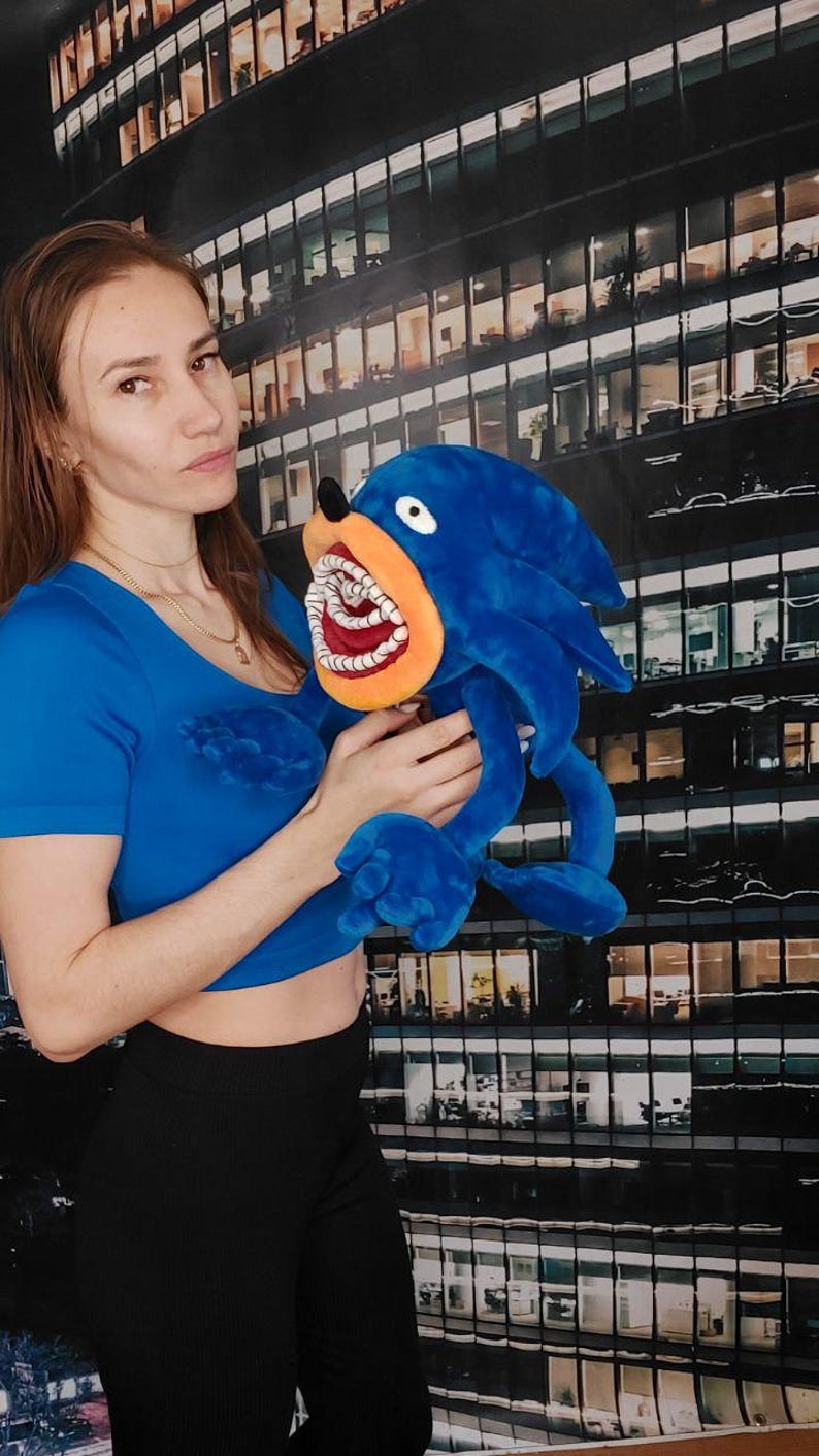 A Toothy Monster is a Soft Plush Toy, Custom-made From a Child's ...
