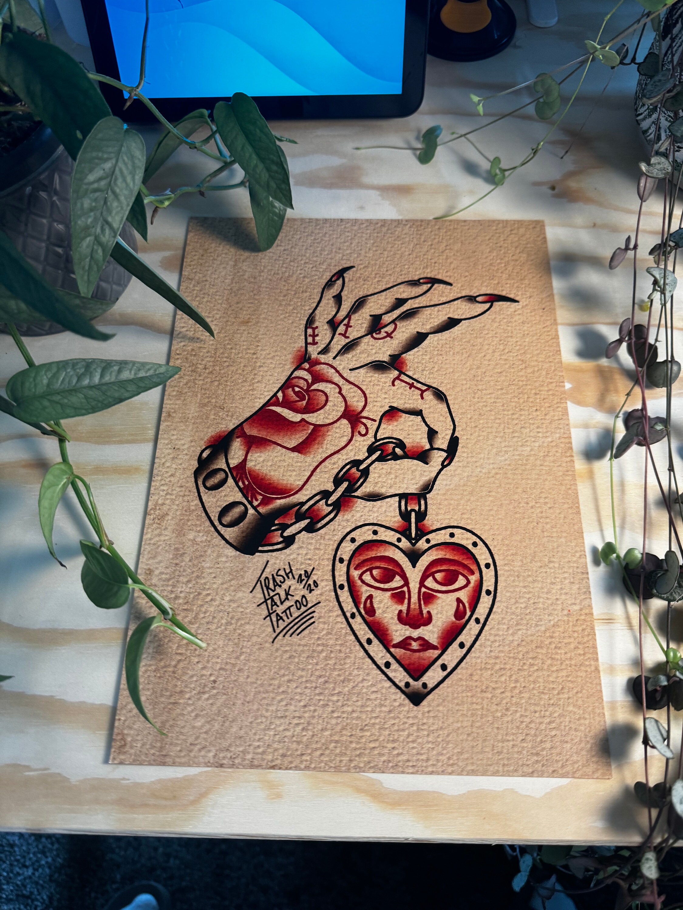 Hand Holding Heart Traditional Tattoo