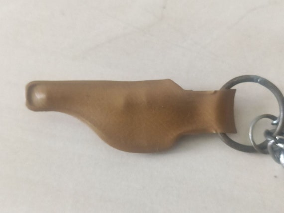 Vintage souvenir keychain revolver in a holster with … - Gem