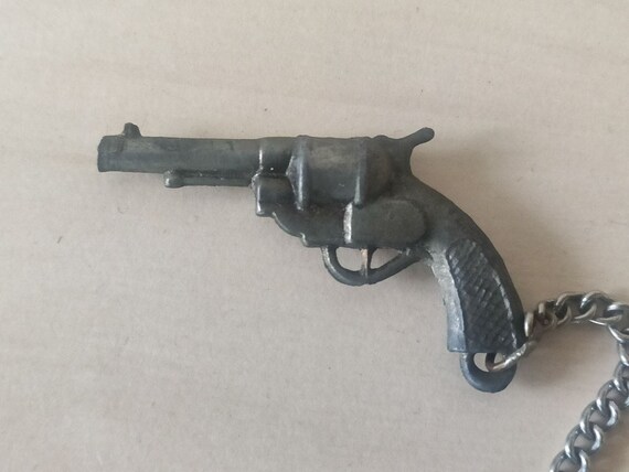 Vintage souvenir keychain revolver in a holster with … - Gem