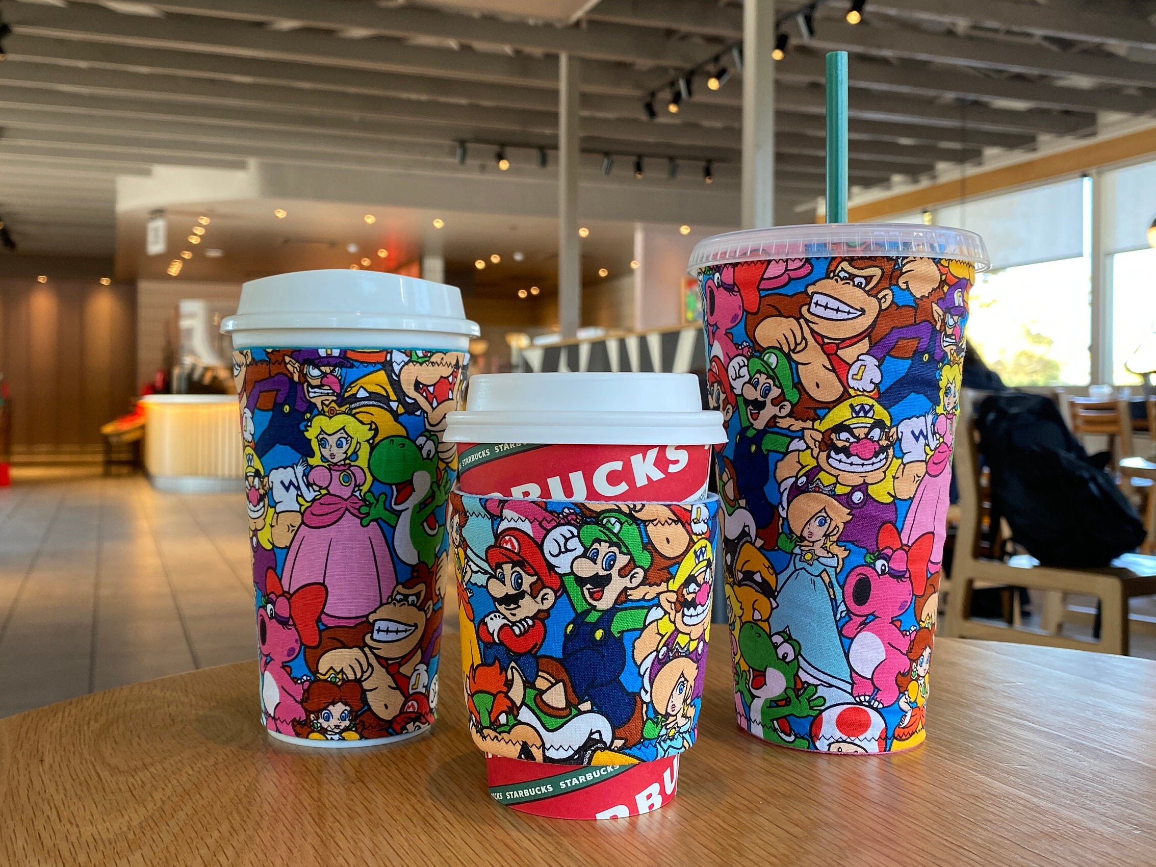 NINTENDO CHARACTERS Coffee Cup Cozy / Mario Luigi Donkey Kong Yoshi ...