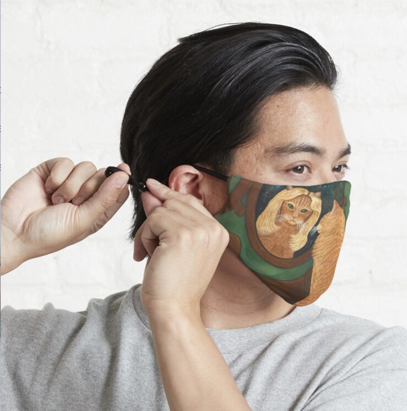 Orange Tabby Cat Looking Into Mirror Face Mask. Whimsical Orange Cat ...