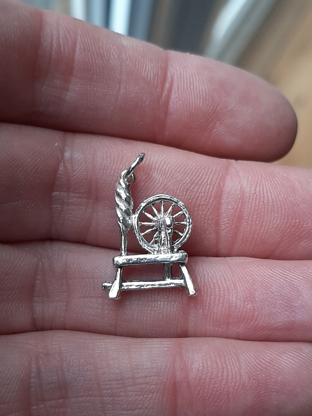 A Silver Spinning Wheel Pendant Charm - Etsy