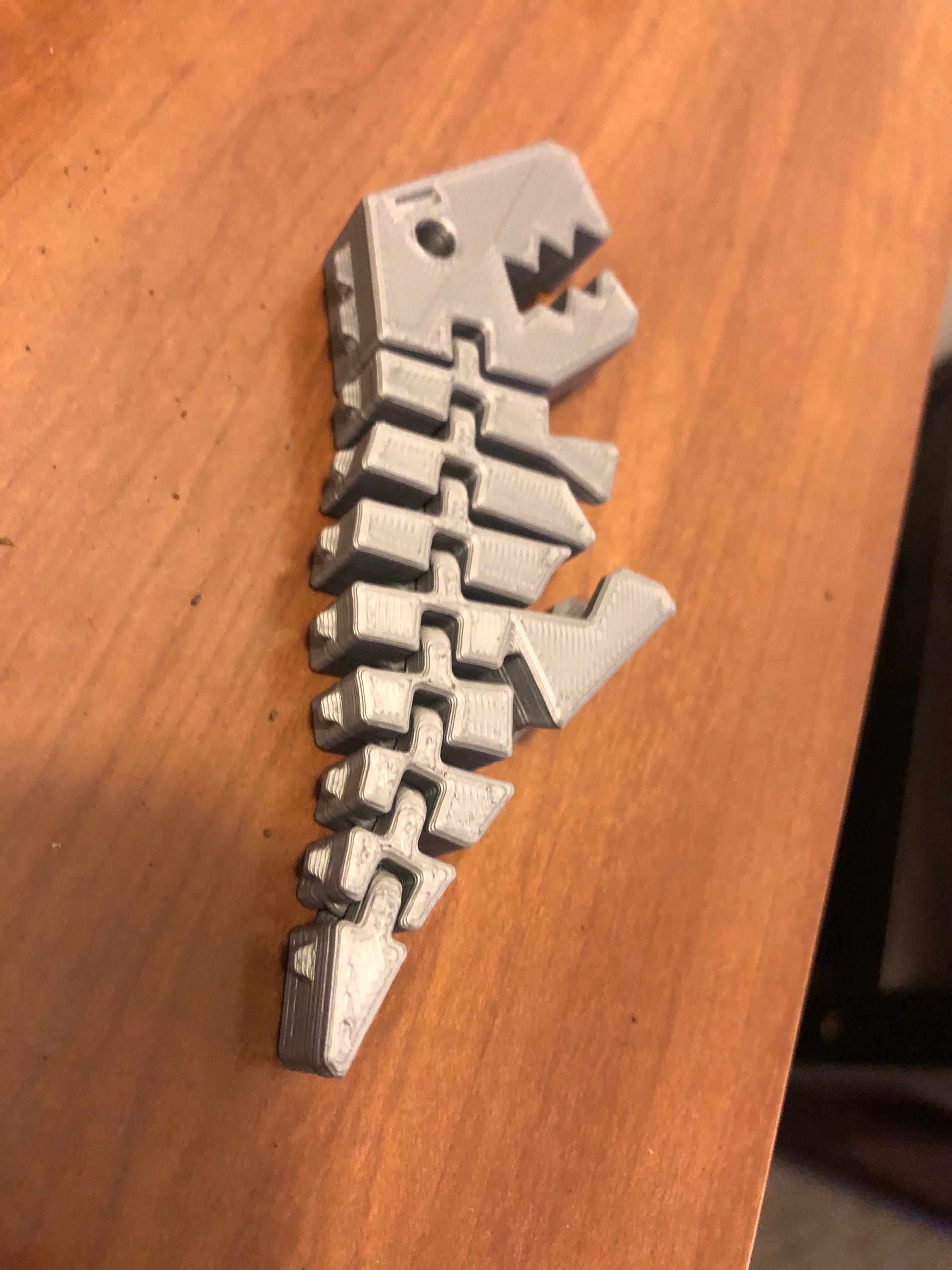 Flexi Rex with stronger links. 3D printed in your color choice ...