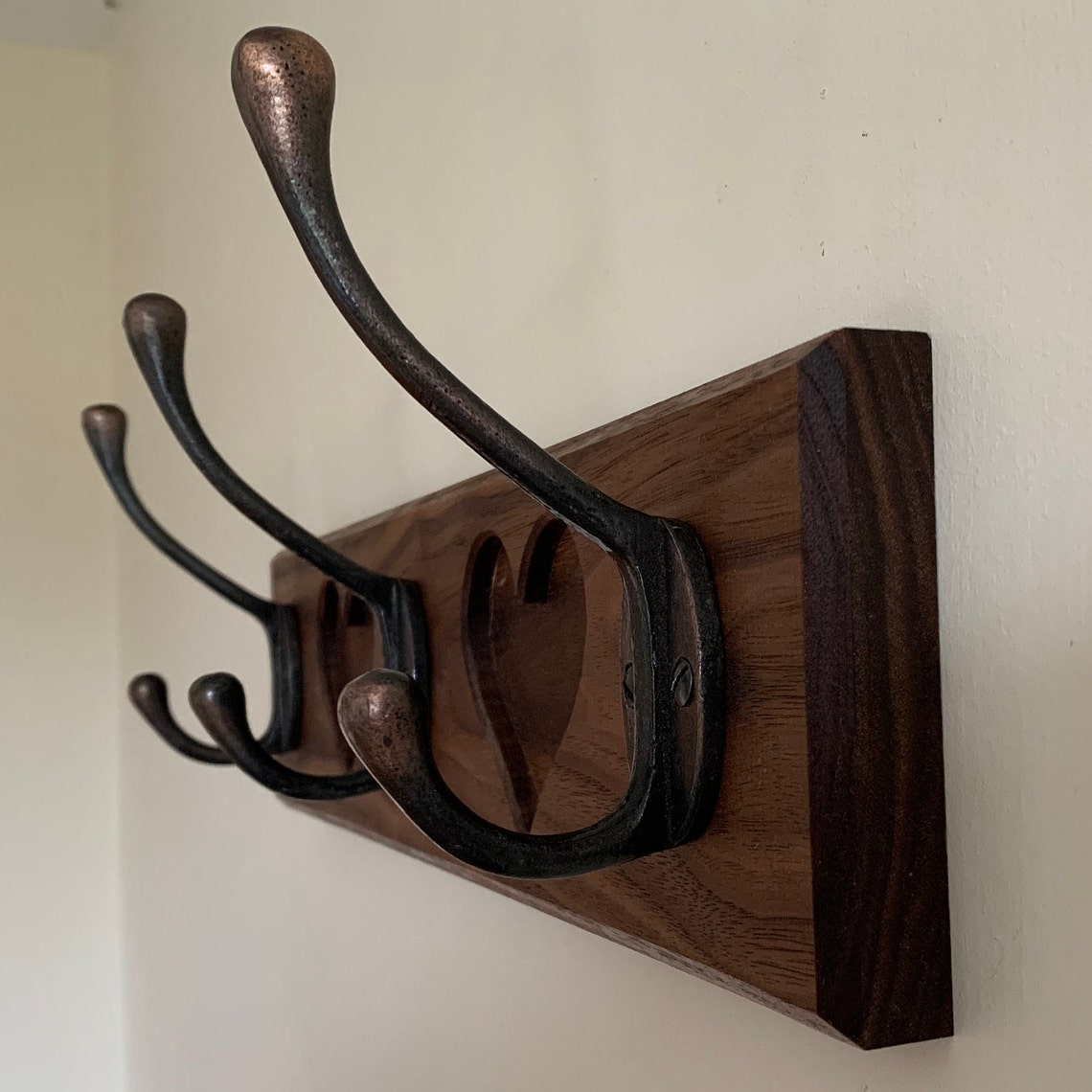 Walnut coat rack with heart recesses - Etsy.de