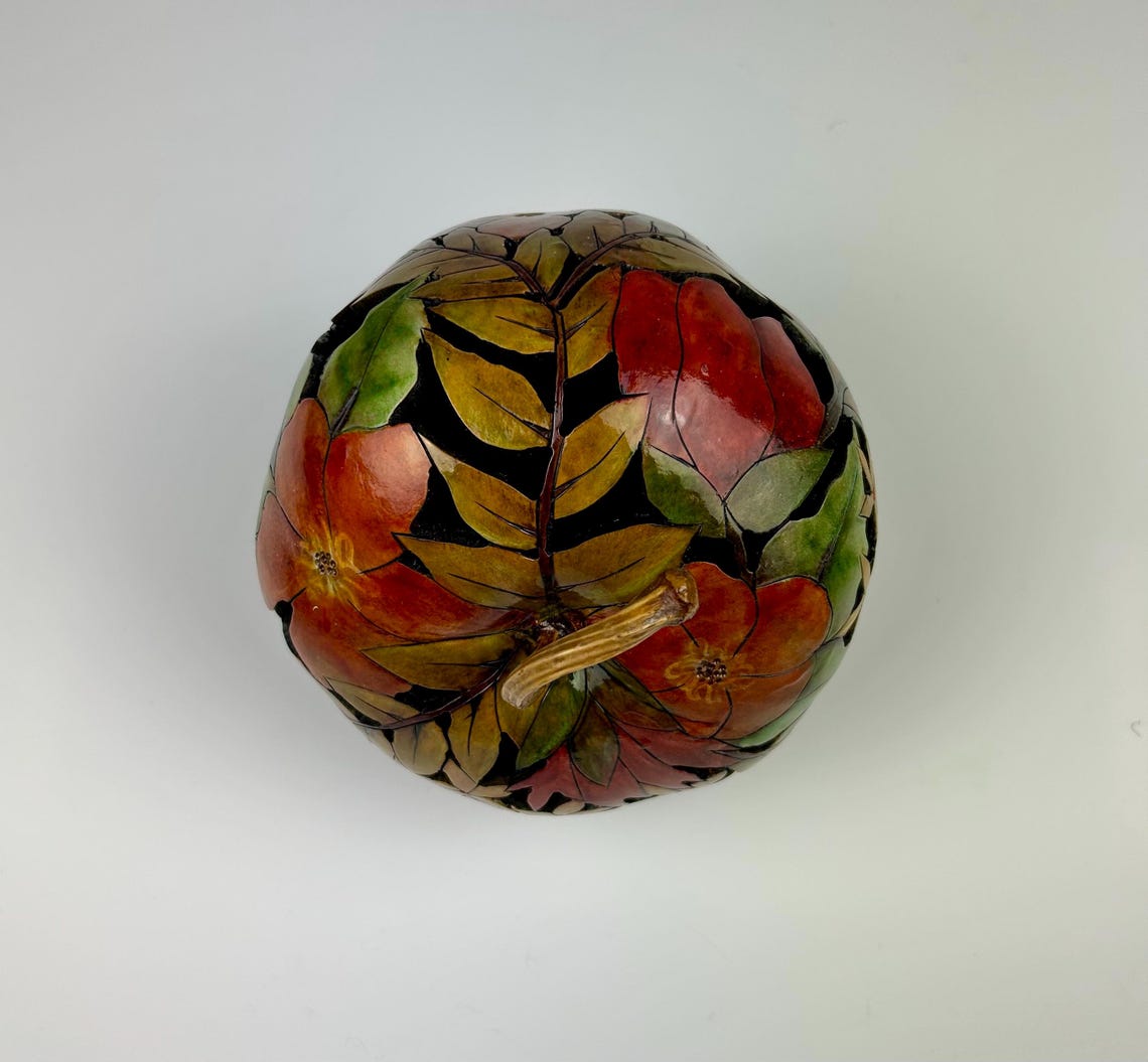 Deep Orange Flowers and Trailing Leaves Incase This Apple Gourd With ...