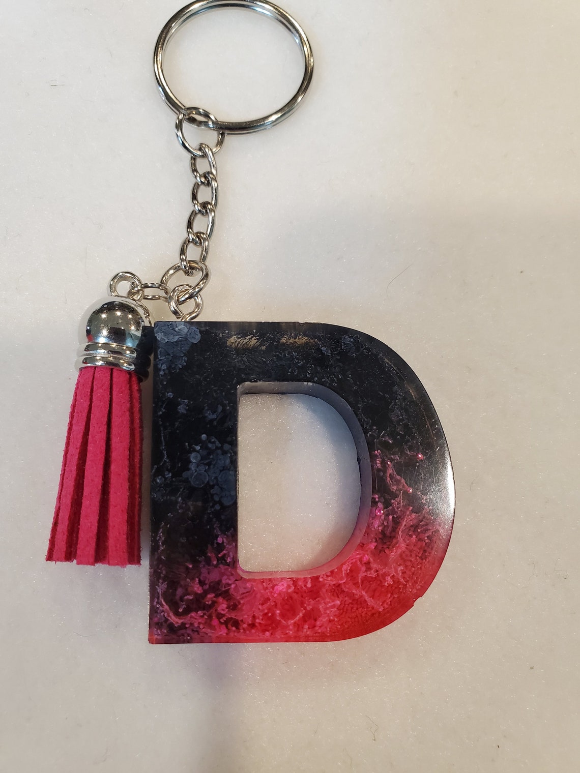 Alphabet letter 'D' resin keychain black and pink | Etsy