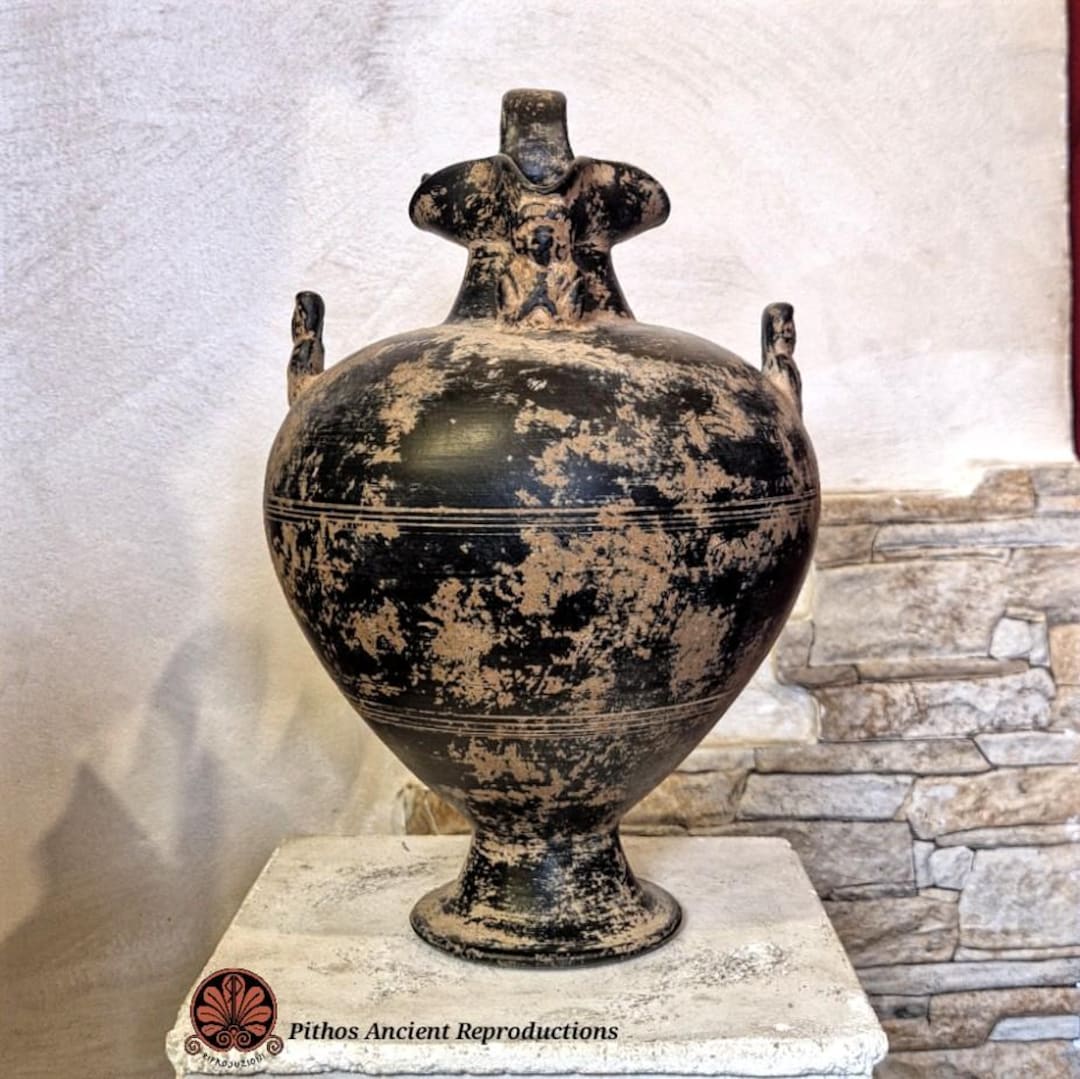 Reproduction of an Etruscan Trilobate Oinochoe Vase With Wheels, in ...