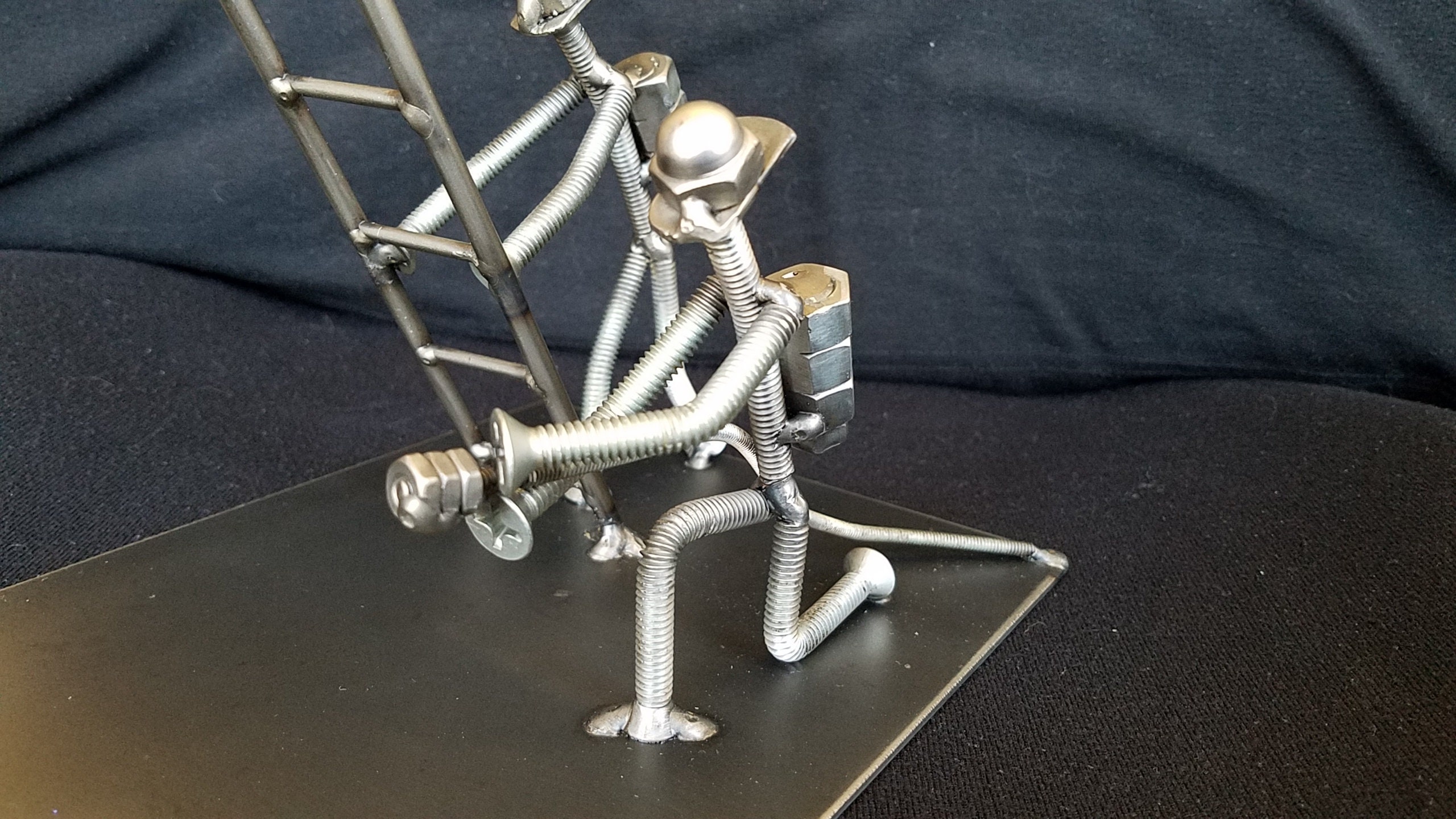 Welded Metal Nuts and Bolts Firefighter Sculpture - Etsy