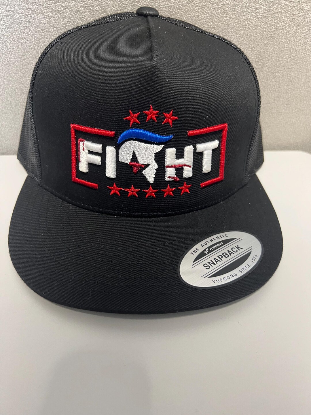 Trump Fight Puff Embroidered Mesh Back Flat Bill Trucker Hat in Black ...