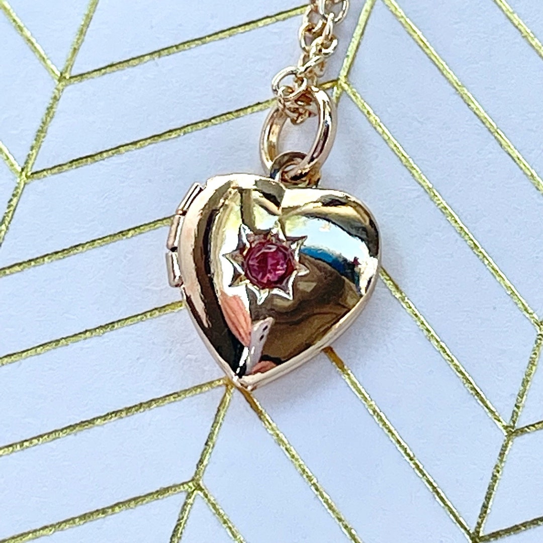 Tiny Gold Toned Heart Locket With Dark Pink Rhinestone in the Center ...