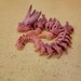 Dragon articulé avec colonne vertébrale à cornes conçu par Shakaworld3D ...
