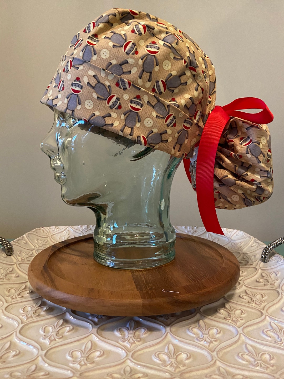 Sock Monkey on Tan Background With Red Ribbon Ponytail Scrub Cap/scrub ...