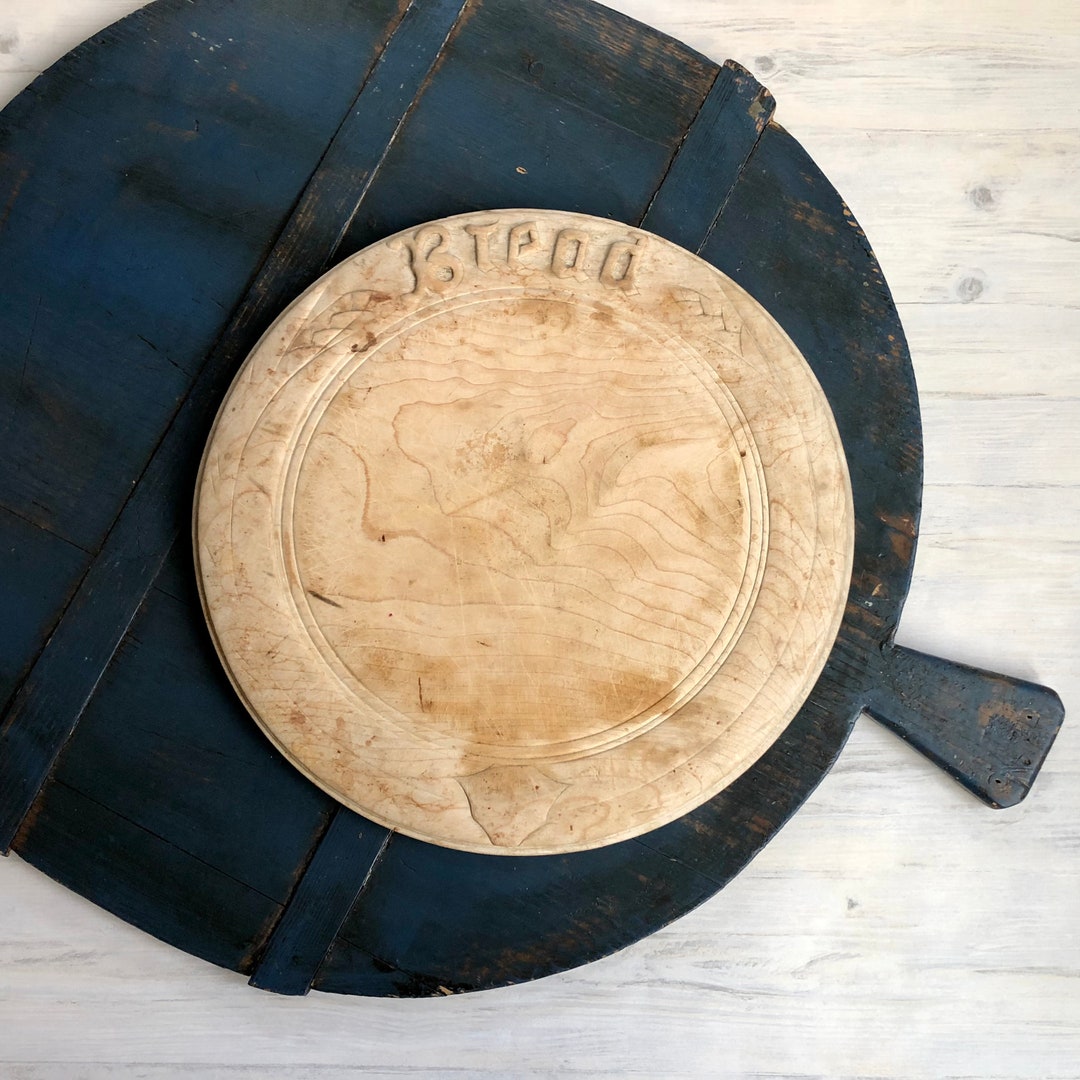 Simple and Classic Round Carved Bread Board, With Bread Carved at the ...