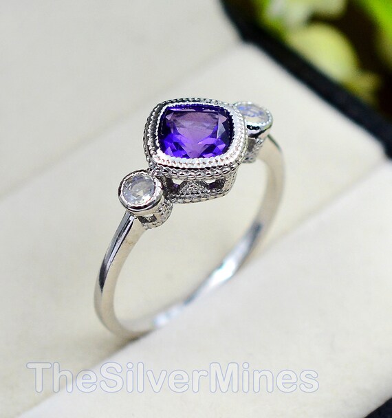 Amethyst and white topaz ring store