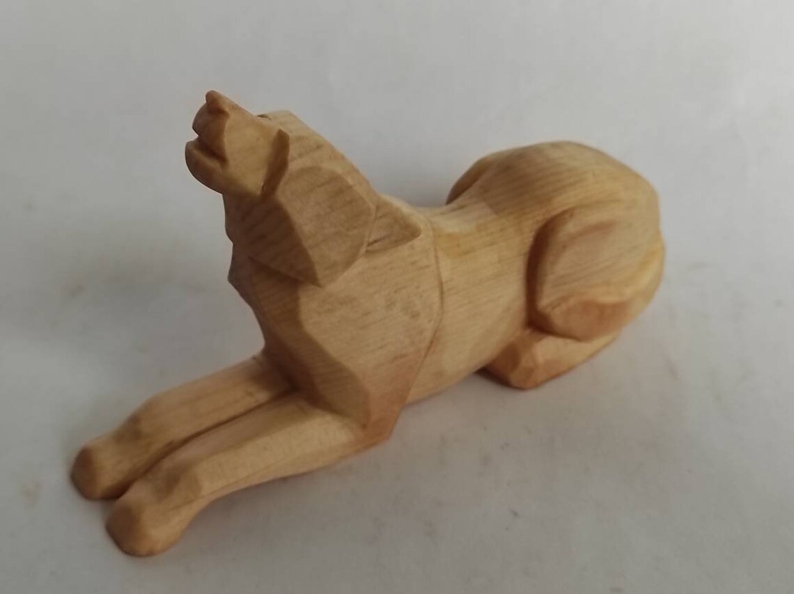 Hand Carved Lying Down Wolf | Etsy