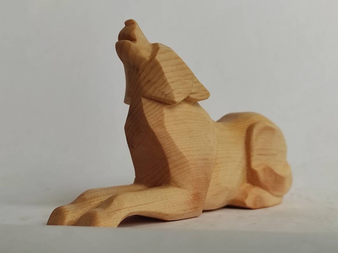 Hand Carved Lying Down Wolf | Etsy