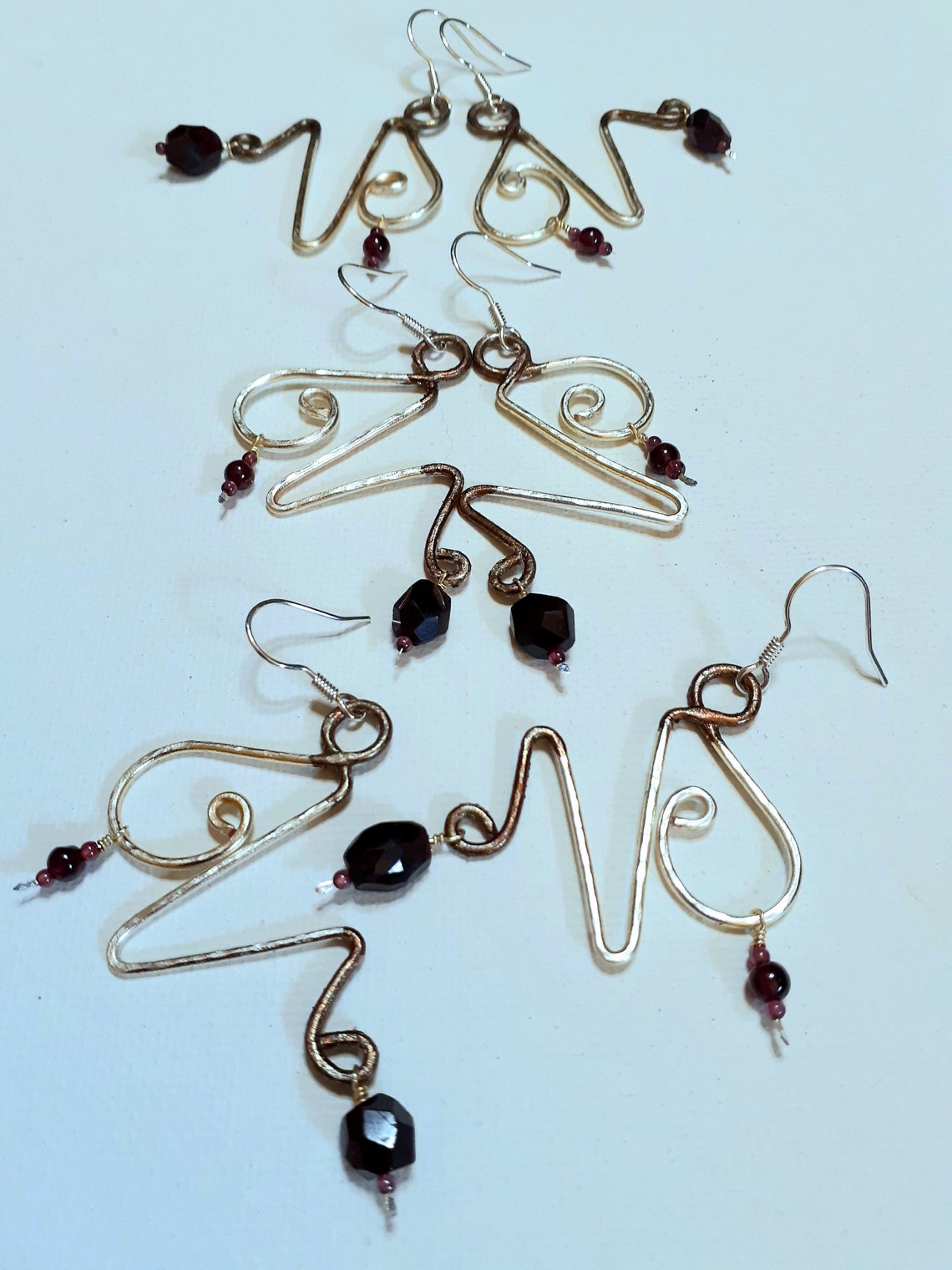 Capricorn Symbol Earring With Garnets, Silver and Antique Finish ...