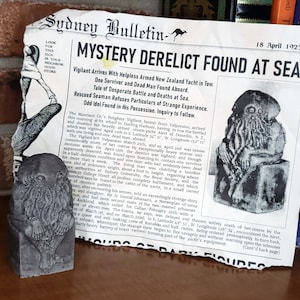 Cthulhu Stone Idol | Newspaper & Crate | Lovecraft Concrete Statue ...