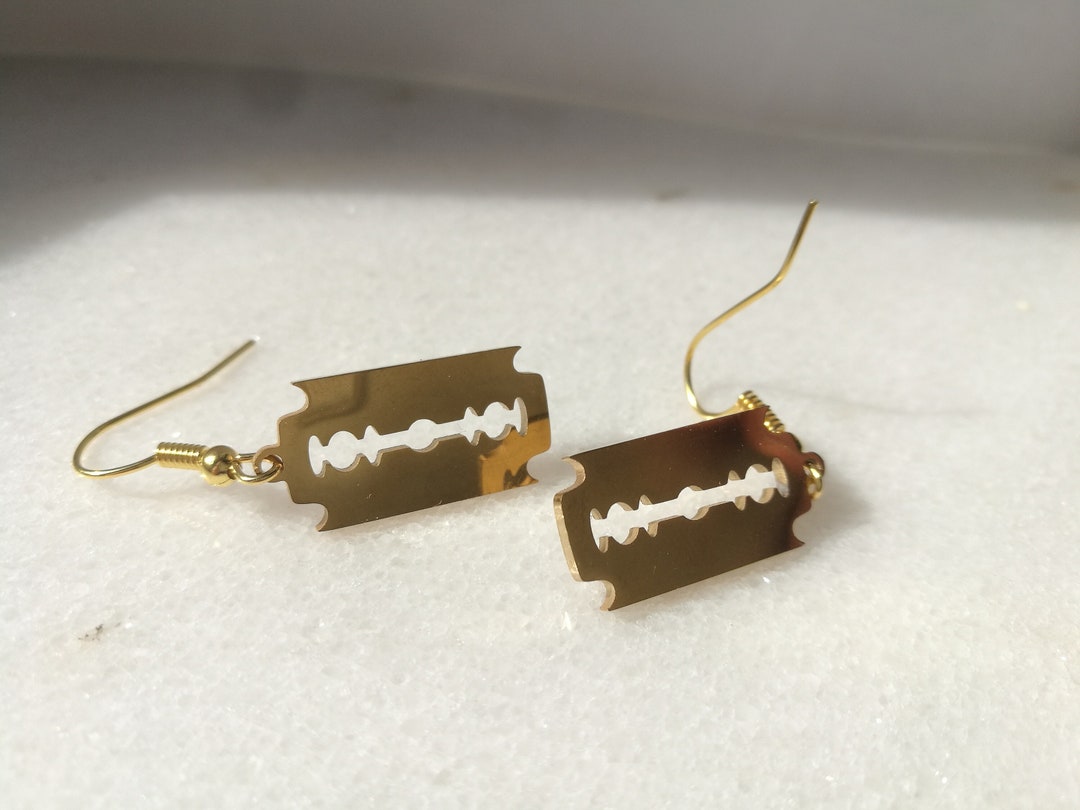 Razor blade gold earrings, bi billie lesbian aesthetic punk charm ...