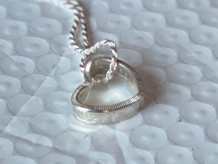 Heart shaped silver coin pendant - Etsy.de