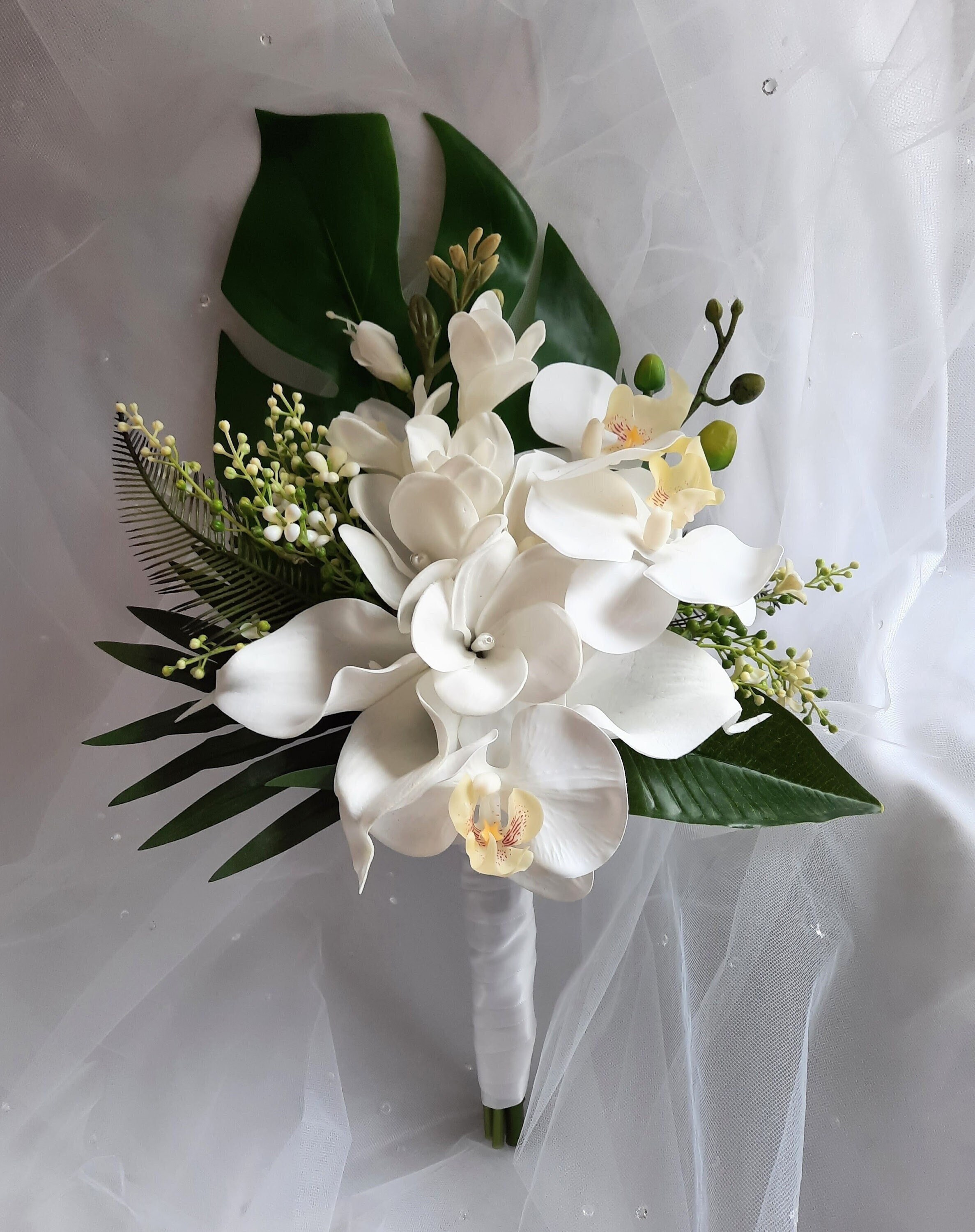 Lily Of The Valley And Orchid Bouquet