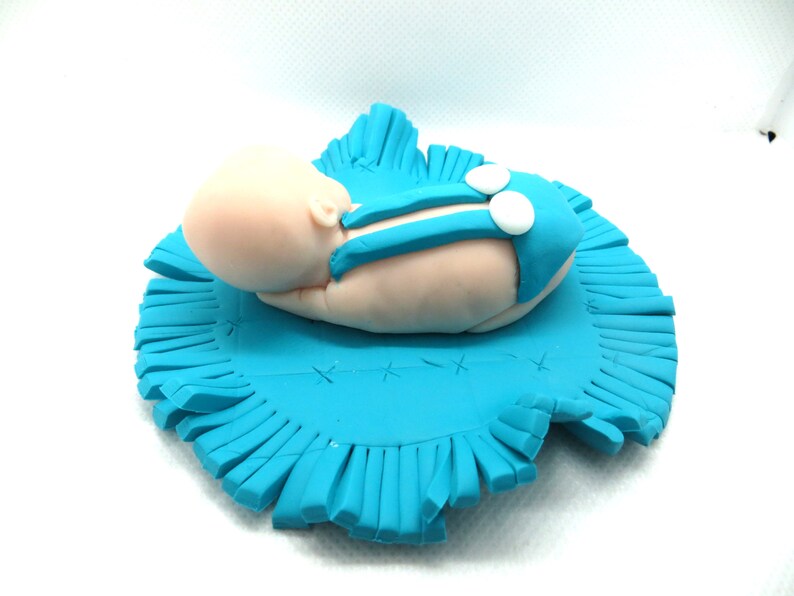 cake topper Baby boy on a blue fringed blanket figurine Party & Gifting ...